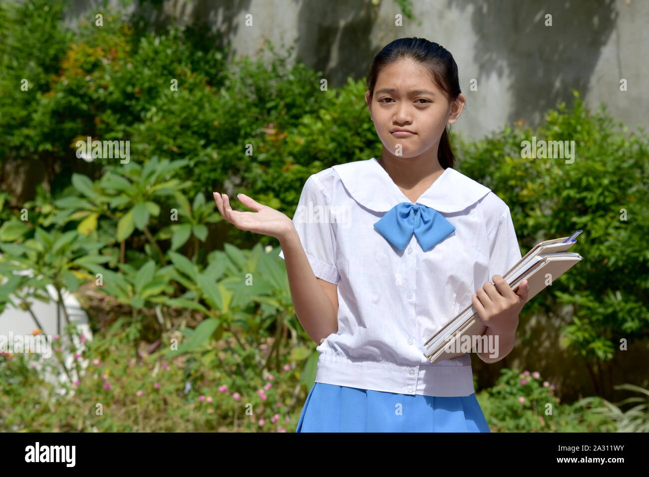 An A Female Student And Indecisiveness Stock Photo - Alamy