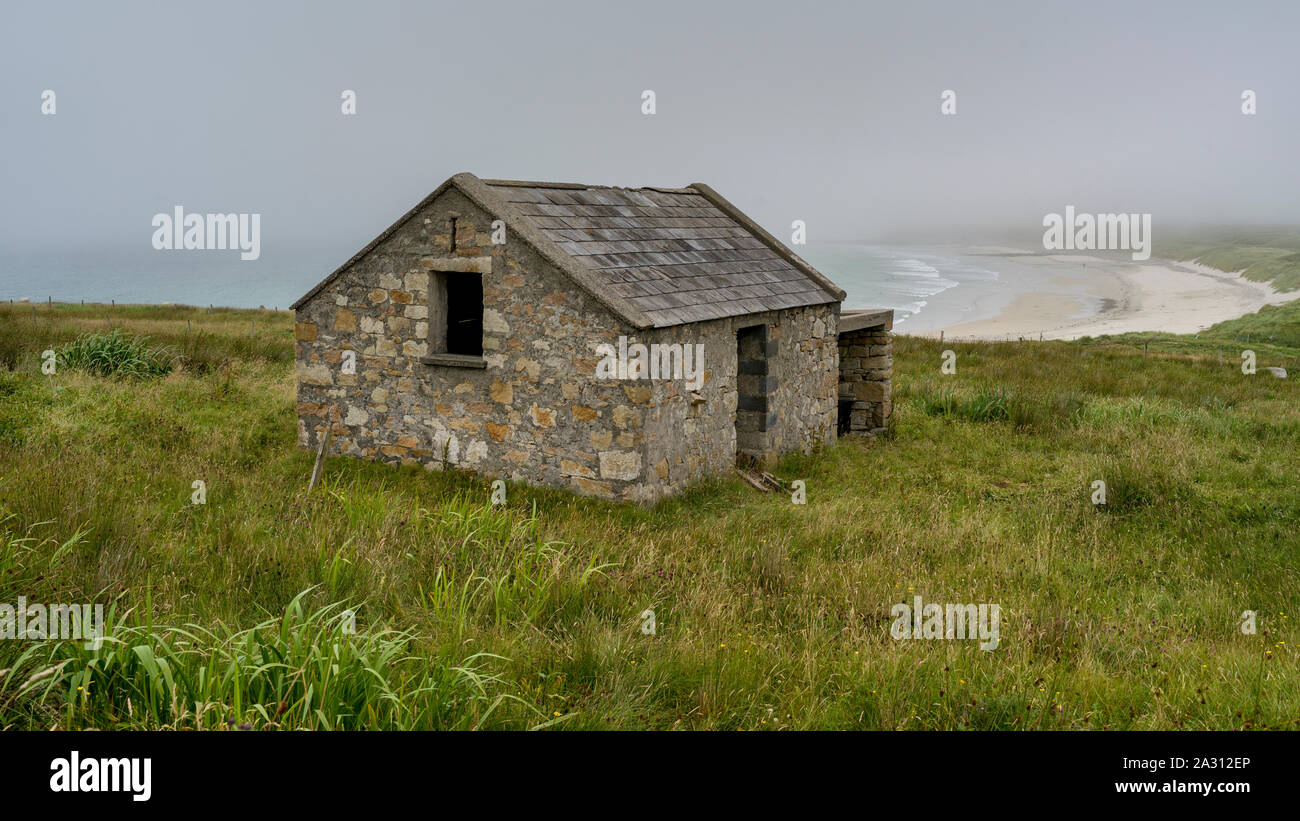 Abandoned building along coastline, Mullet Peninsula, Binghamstown ...