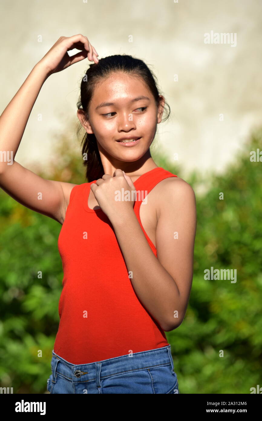 A Posing Minority Teenage Female Stock Photo - Alamy