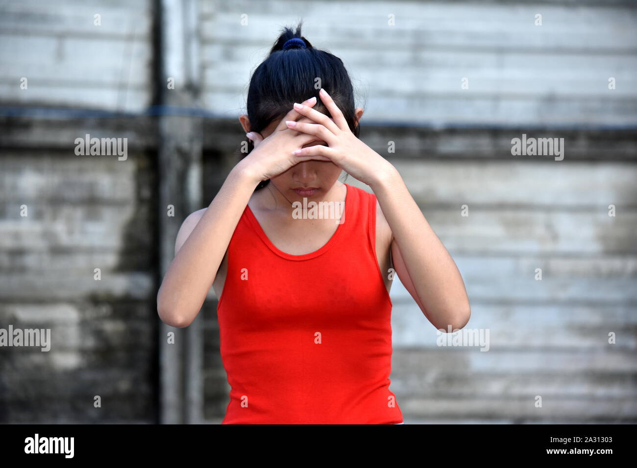 An A Worried Filipina Person Stock Photo - Alamy