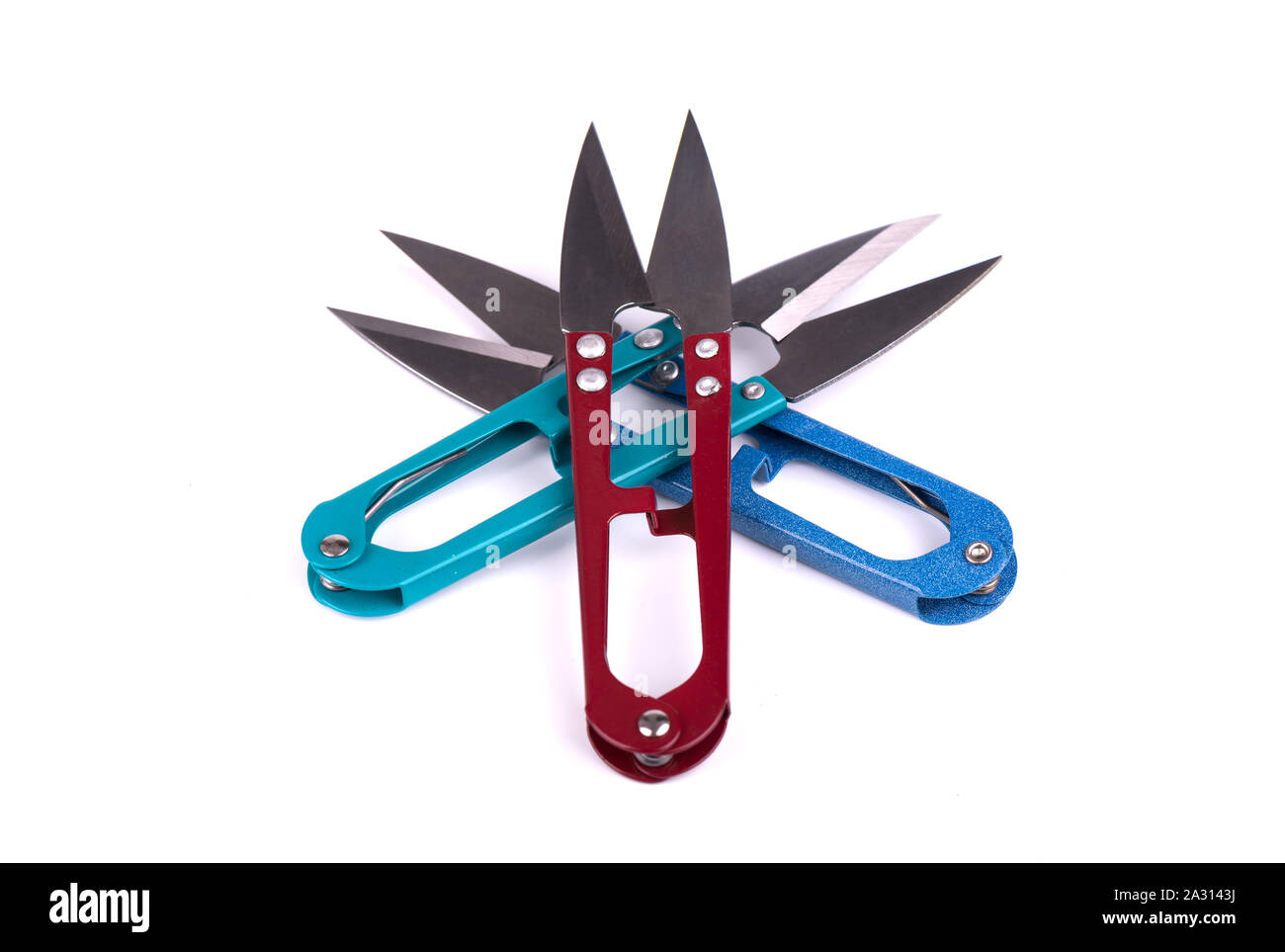 Small scissors for cutting the thread isolated on white background ...