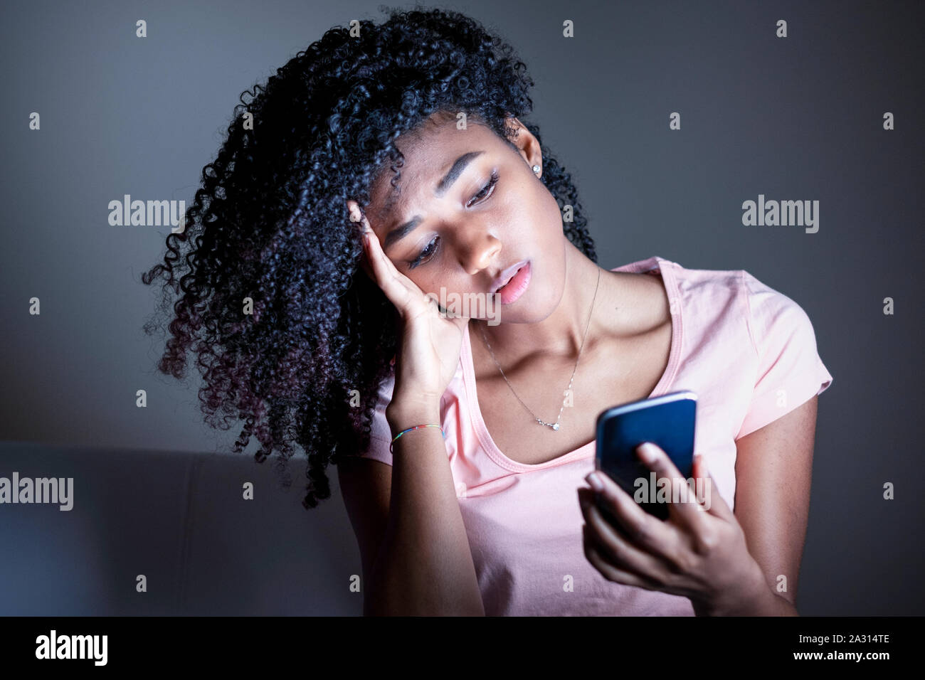 Woman watching smartphone hi-res stock photography and images - Alamy