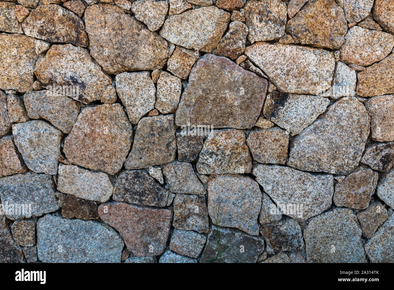 Background stone wall of granite stones. Horizontal orientation Stock ...