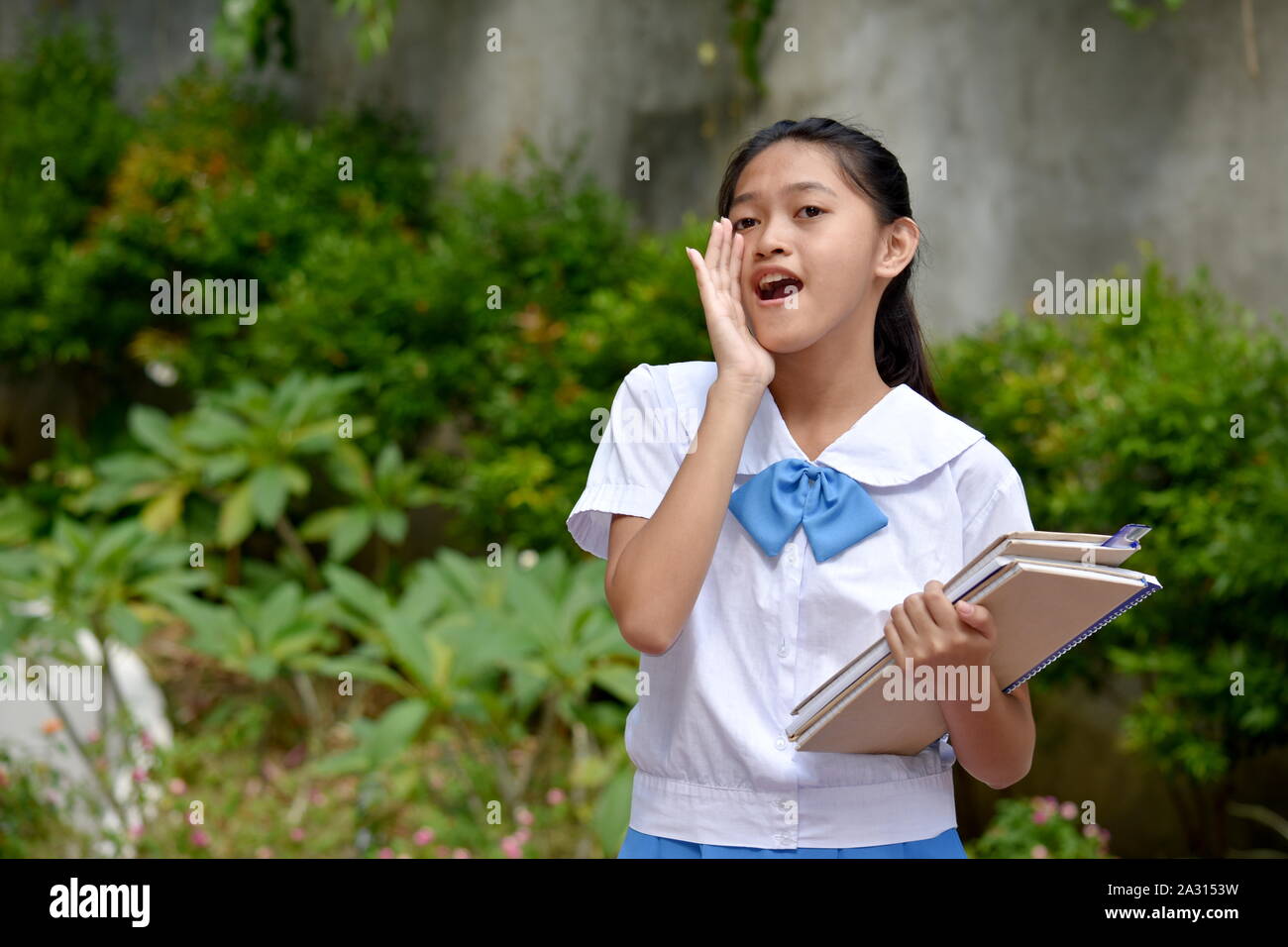 Student Teenager School Girl Yelling With School Books Stock Photo - Alamy