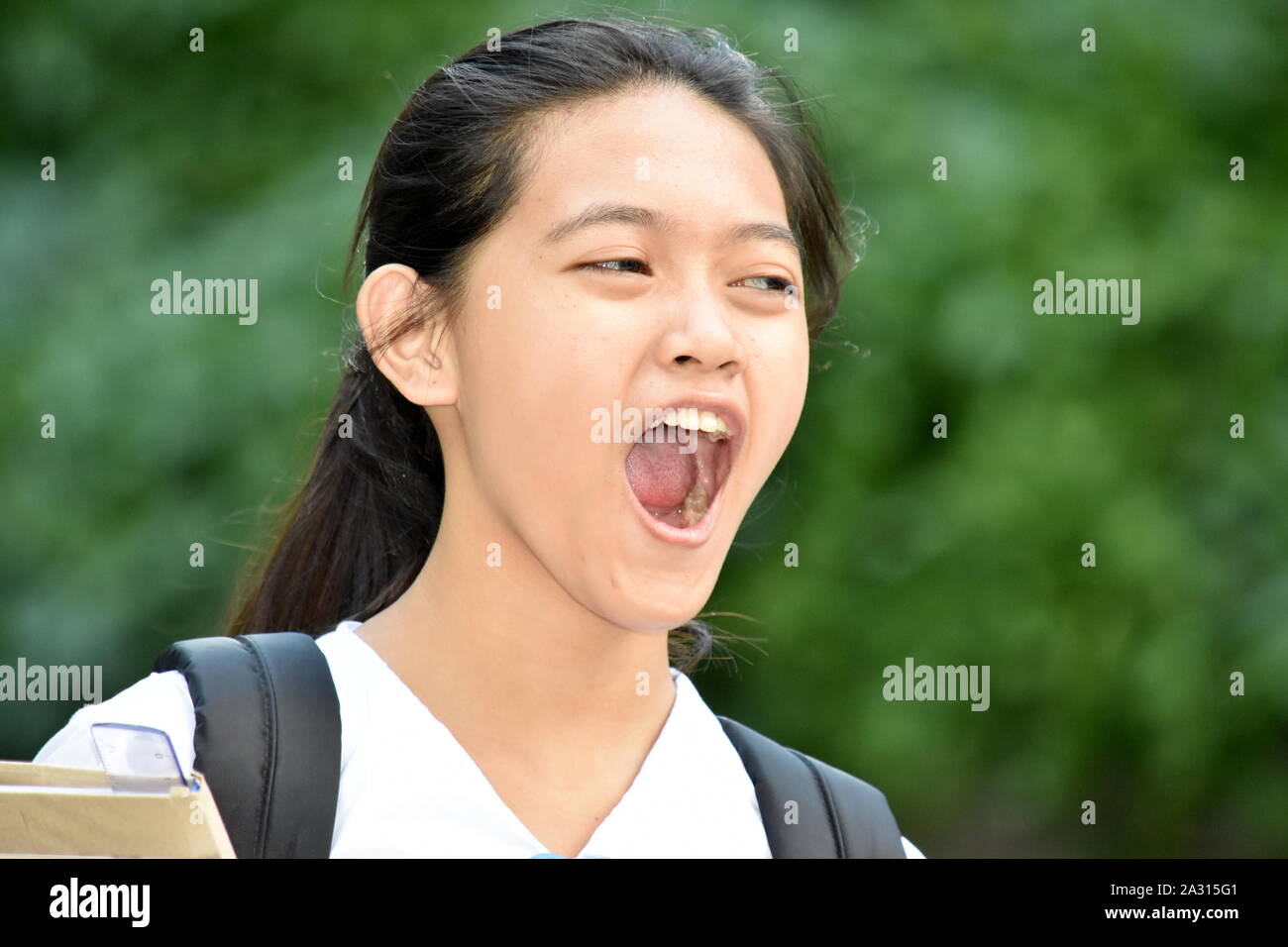 A Cute Female Student Shouting Stock Photo - Alamy