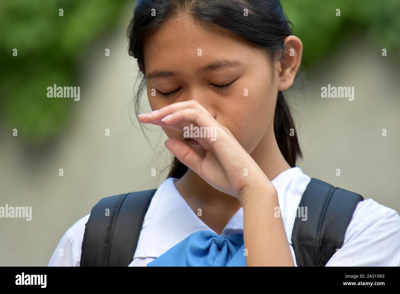 A Youthful Minority Female Student Crying Stock Photo - Alamy