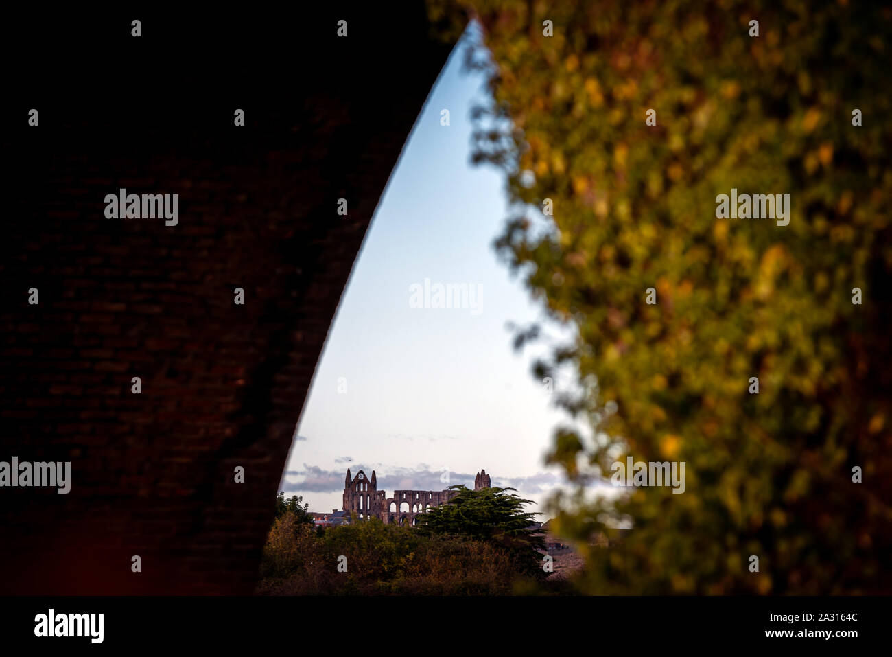 Whitby Abbey ruins seen through the arches of the Larpool Viaduct Stock ...