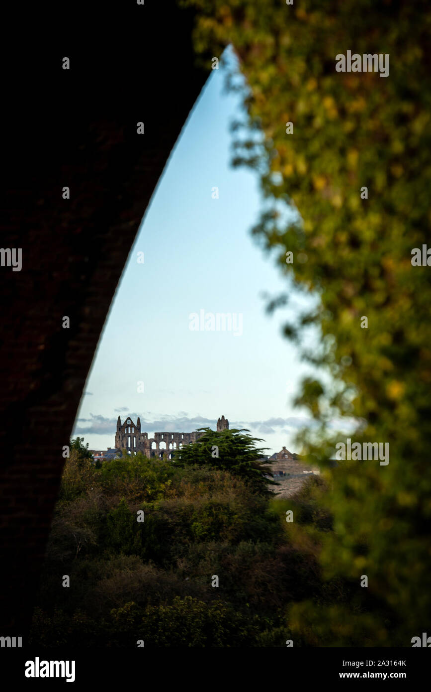 Whitby Abbey ruins seen through the arches of the Larpool Viaduct Stock ...