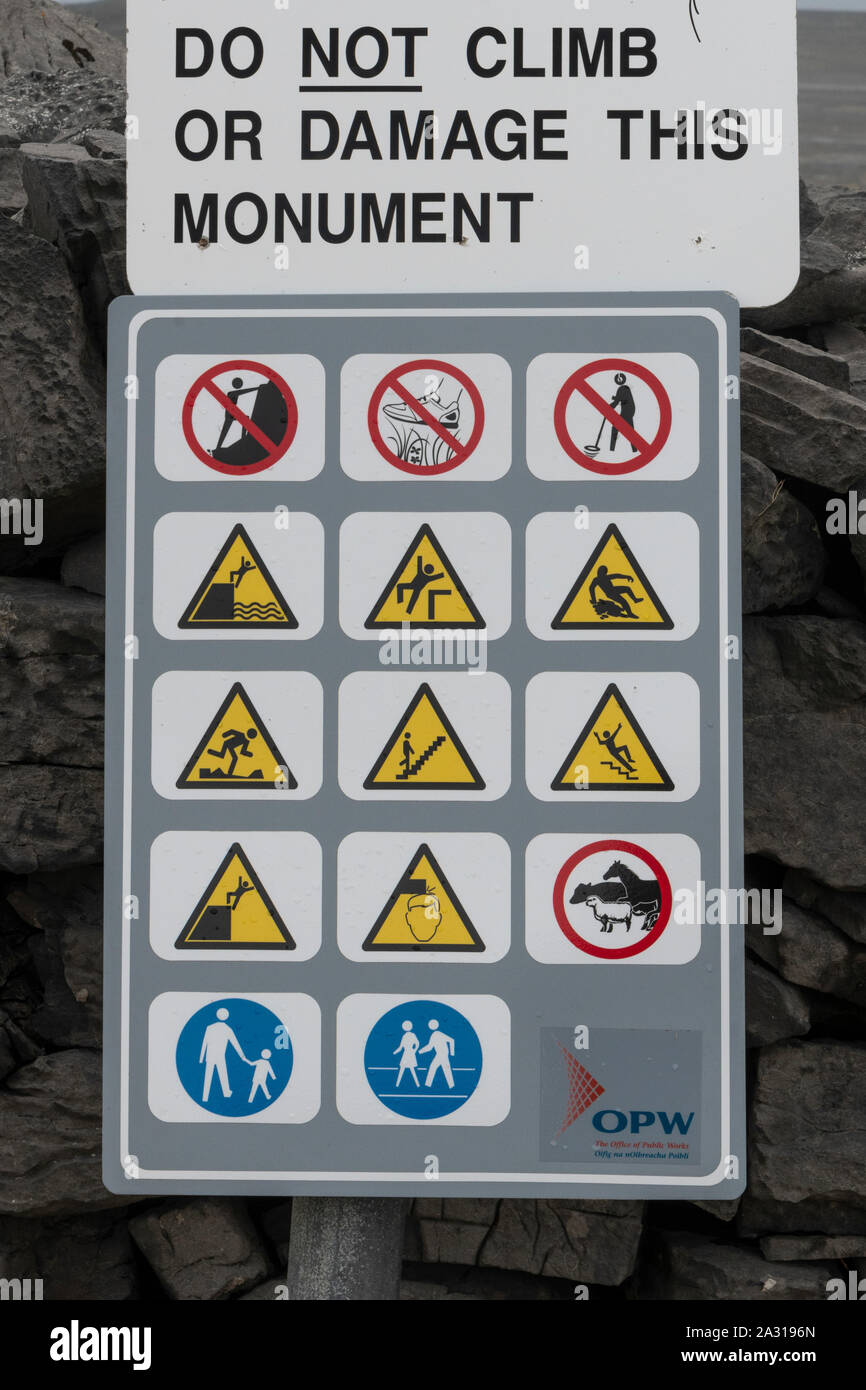 Close-up of warning signs at a prehistoric castle, Dun Aonghasa ...