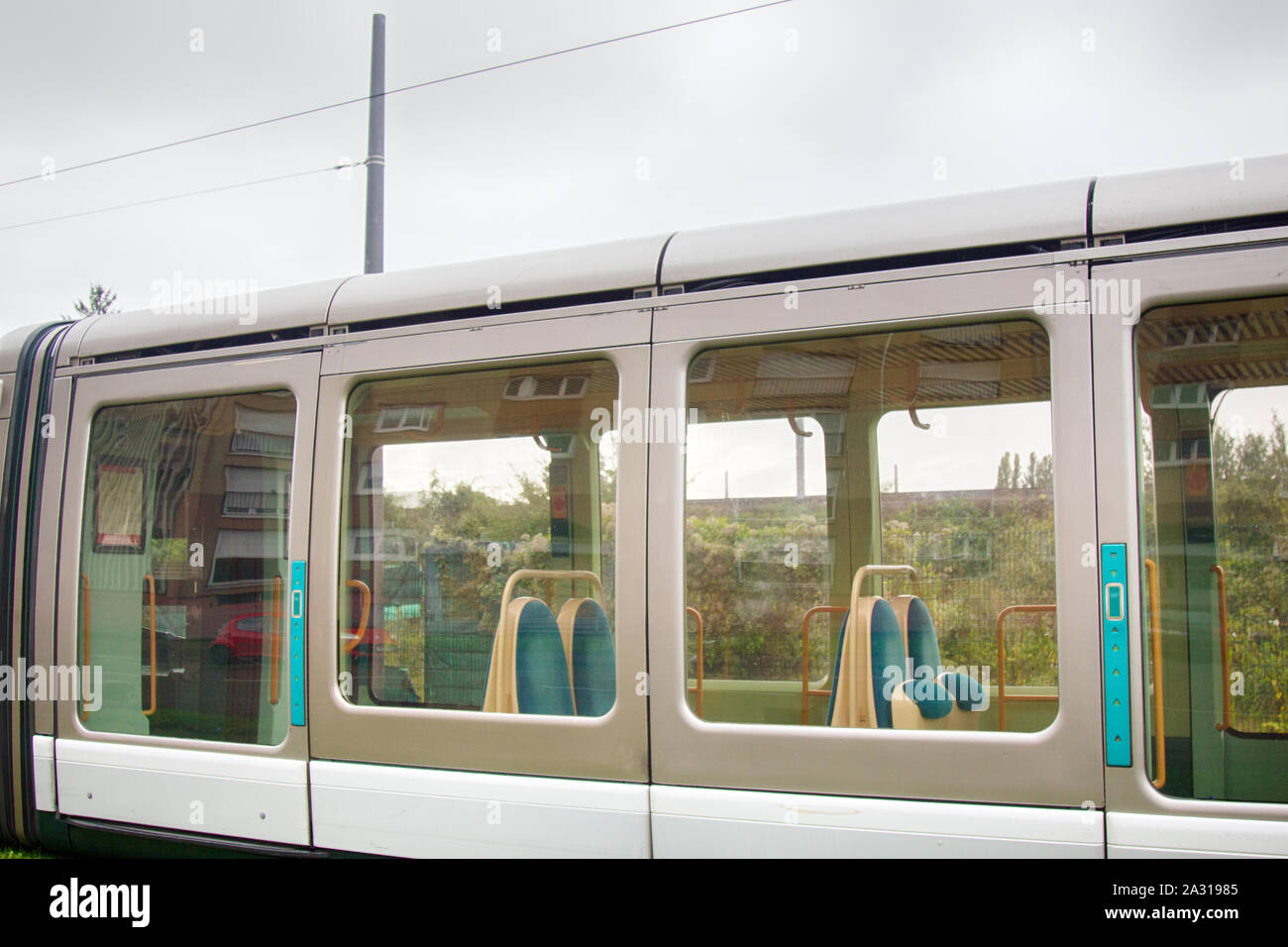 Modern tram with huge Windows for city view, passenger carriage Stock ...