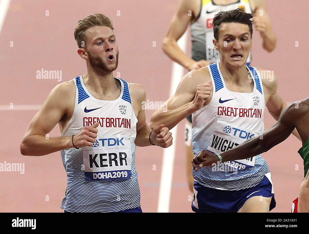 Great Britian's Josh Kerr (left) and Jake Wightman cross the finish ...