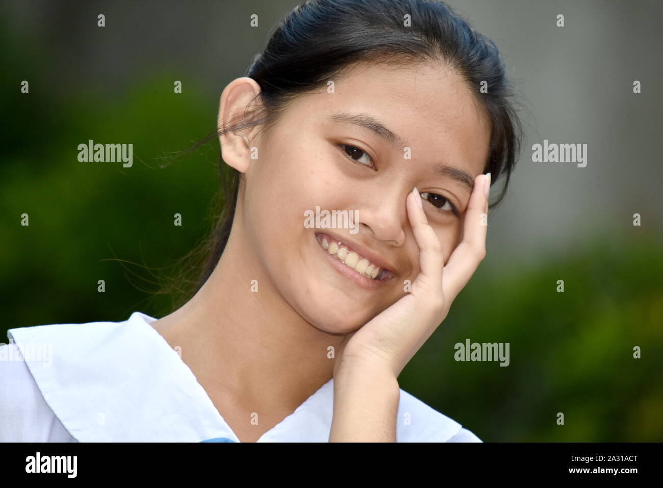 A Teenage Female And Shyness Stock Photo - Alamy