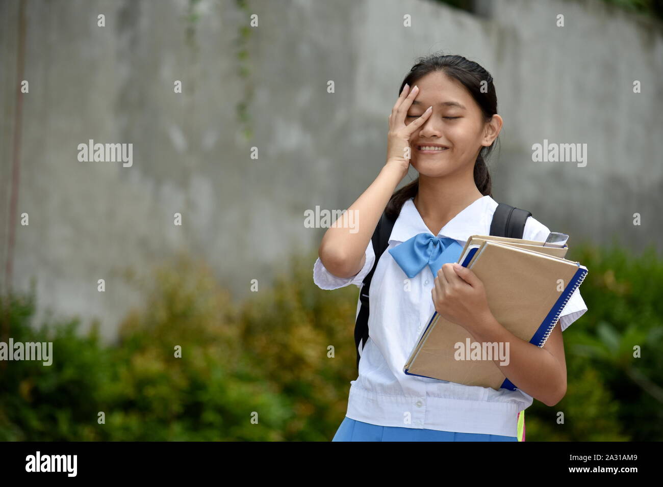 A Shy Female Student Stock Photo - Alamy