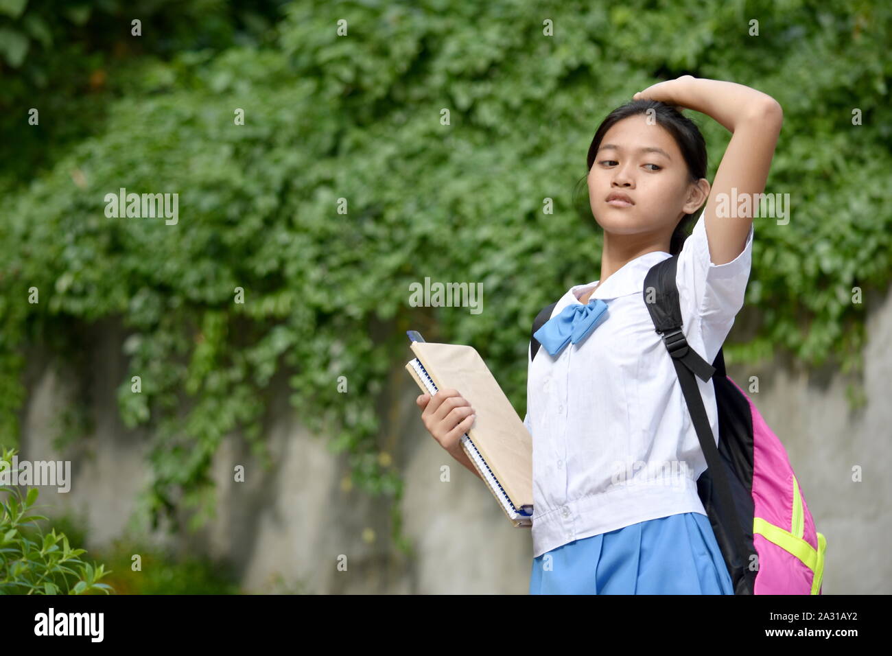 An A Contemplative Asian Person Stock Photo - Alamy