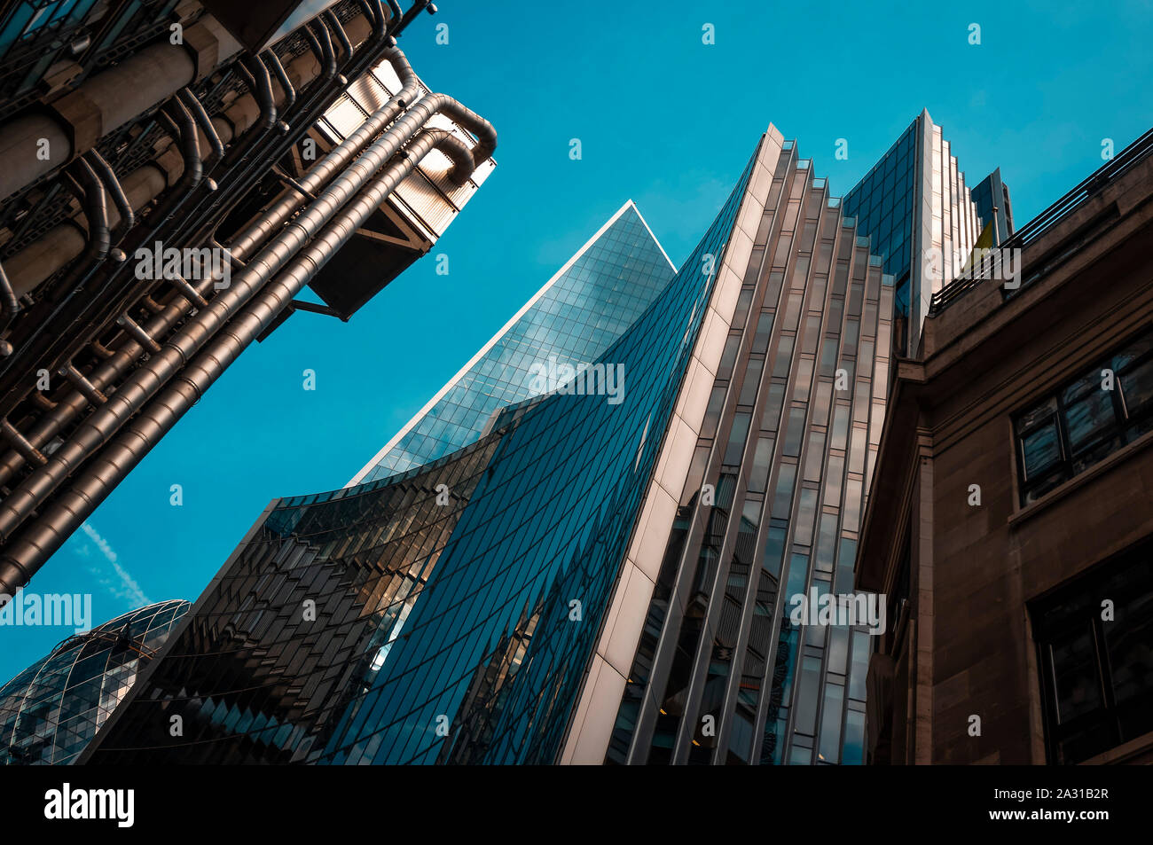 View looking upwards to The Lloyd's Building and The Willis Building in ...