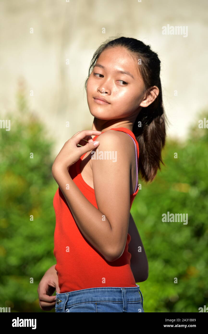 A Serious Youthful Asian Person Stock Photo - Alamy