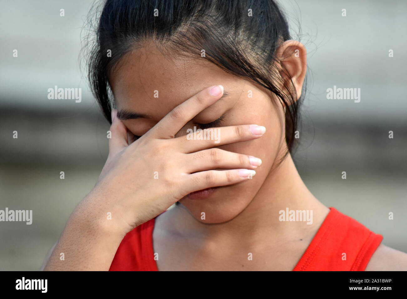 A Young Filipina Female And Depression Stock Photo - Alamy