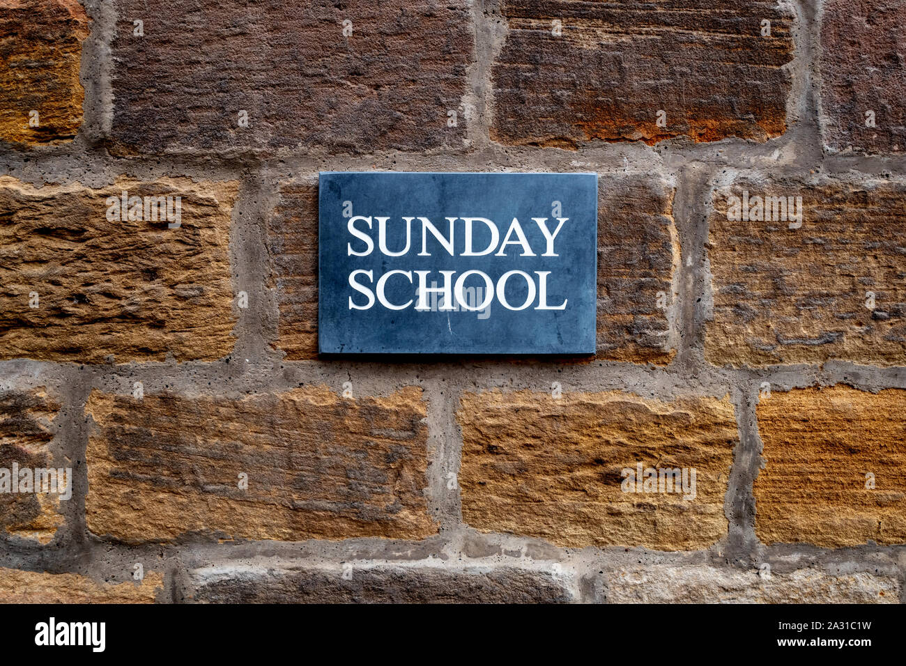 A Sunday School sign in Staithes Stock Photo - Alamy