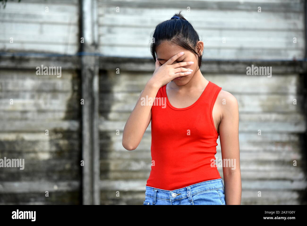 A Sad Youthful Filipina Person Stock Photo - Alamy