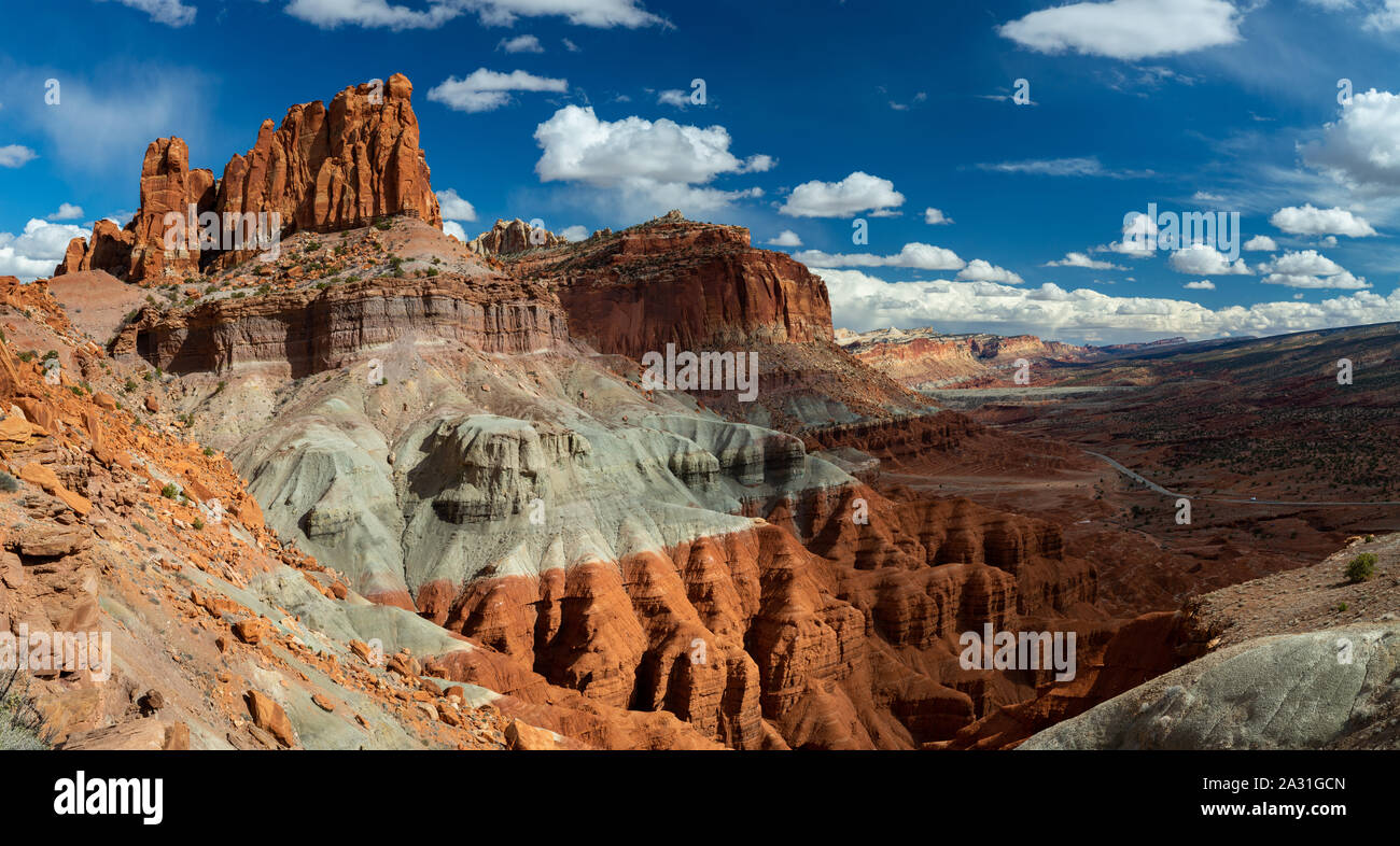 Wingate Sandstone spires towering above Highway 24 and the surrounding ...