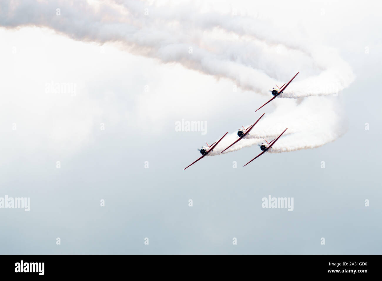 Planes performing acrobatic flight at air show Stock Photo - Alamy