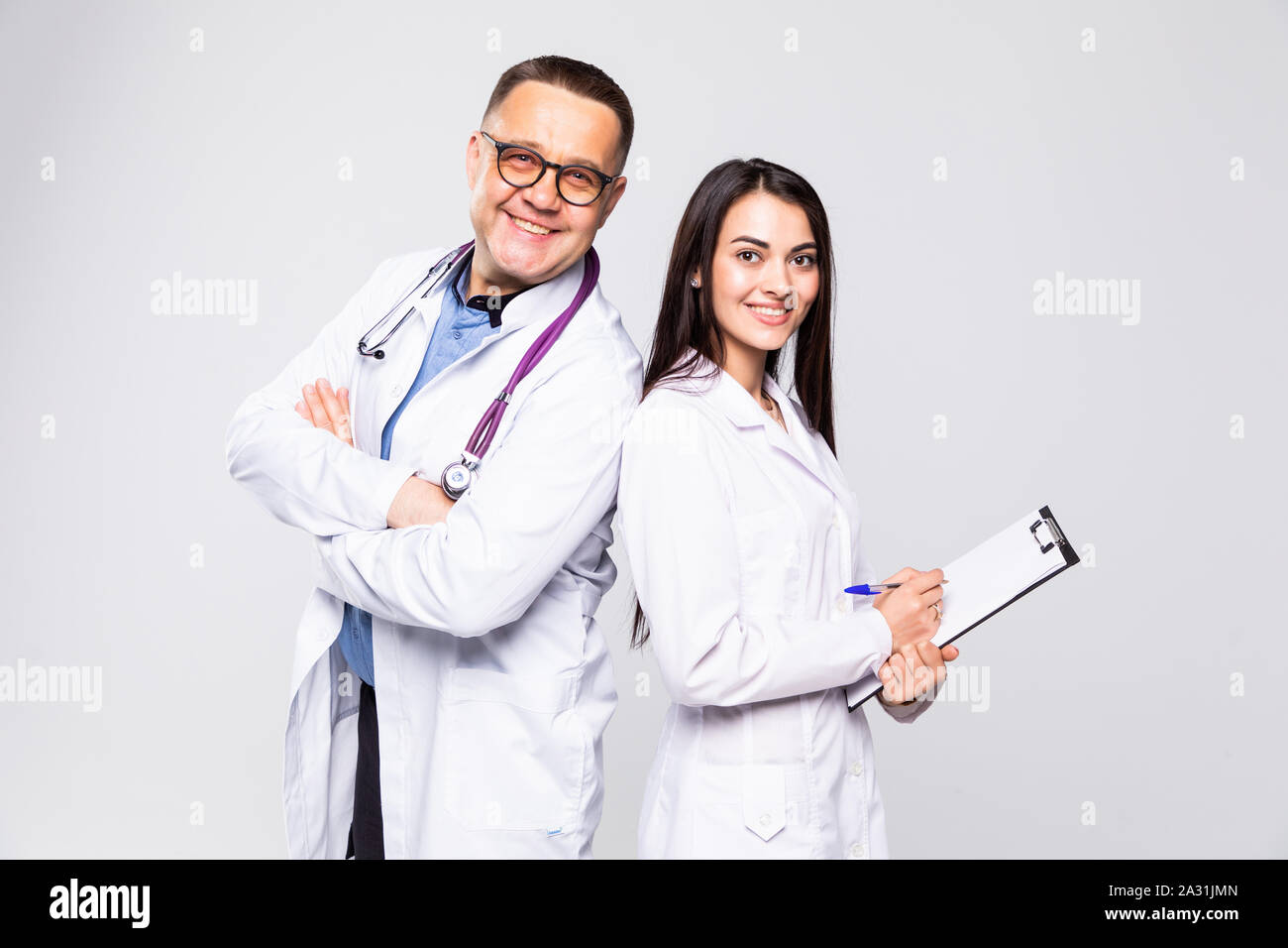 Portrait of two smiling medical workers Stock Photo - Alamy