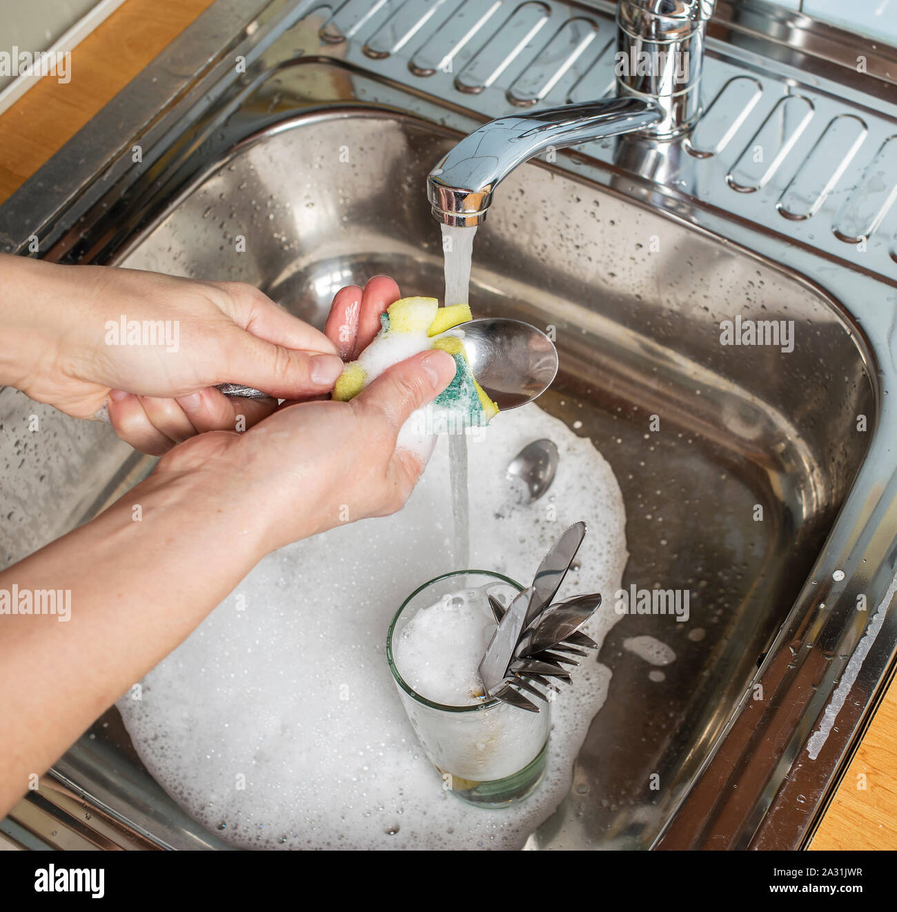 Spoon under water hi-res stock photography and images - Alamy