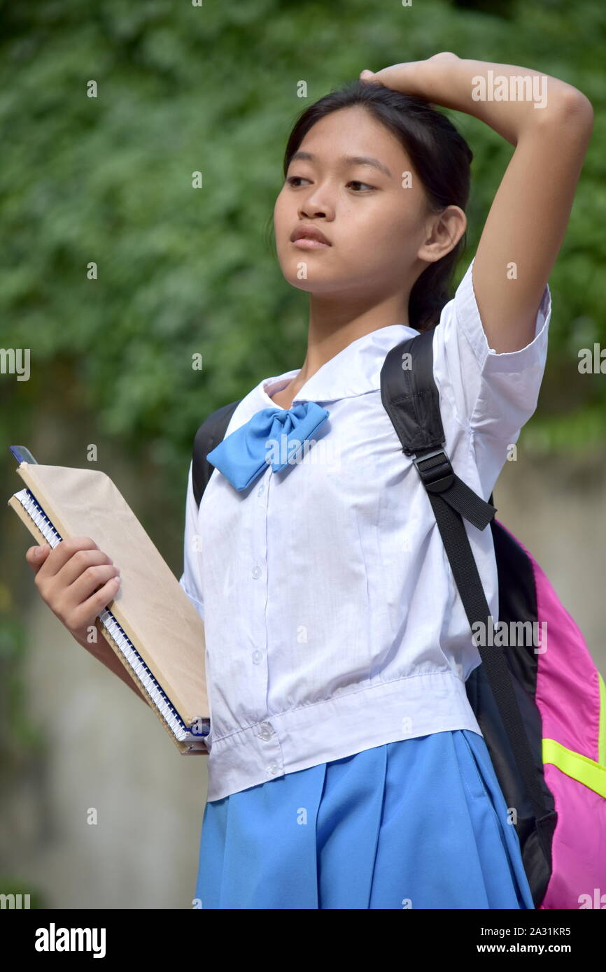 A Wondering Pretty Diverse Female Student Stock Photo - Alamy