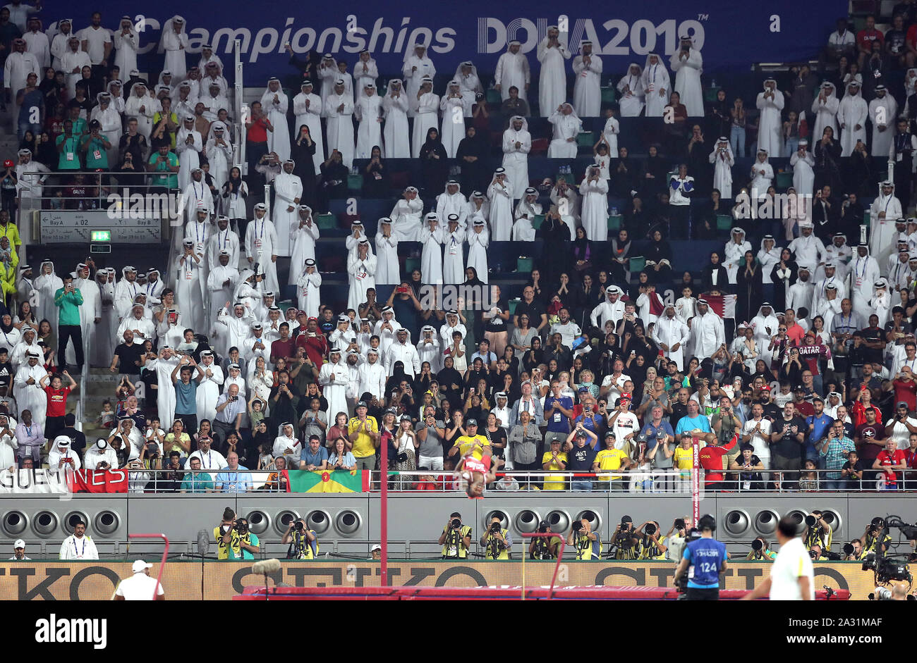The crowds celebrate Qatar's Mutaz Essa Barshim during the High Jump ...