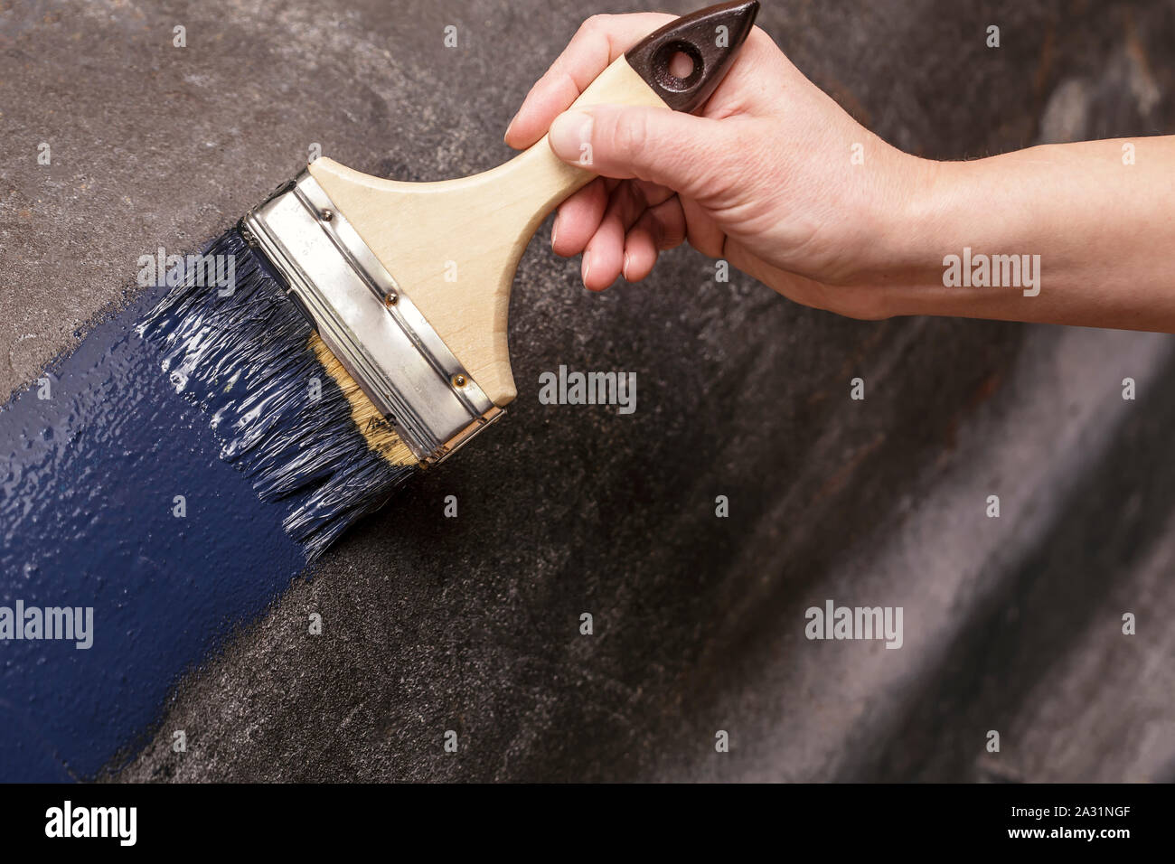 Man draws metal surface hi-res stock photography and images - Alamy