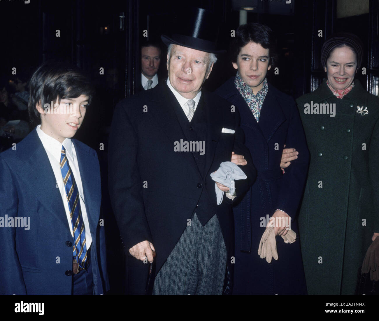 Charles Chaplin in formal wear, with his wife Oona and family, 1965 ...