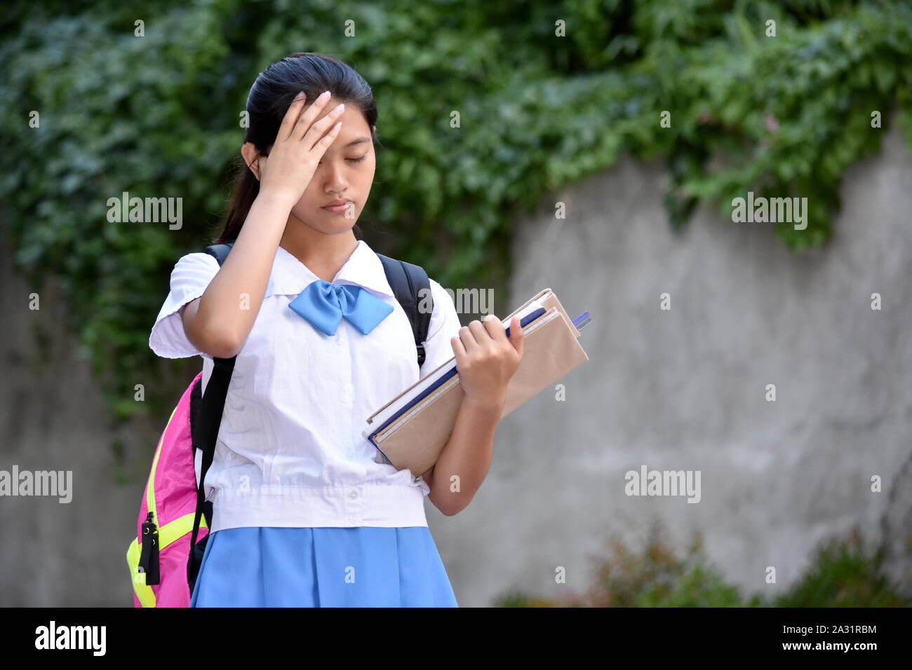 A Stressed Youthful Filipina Girl Student Stock Photo - Alamy