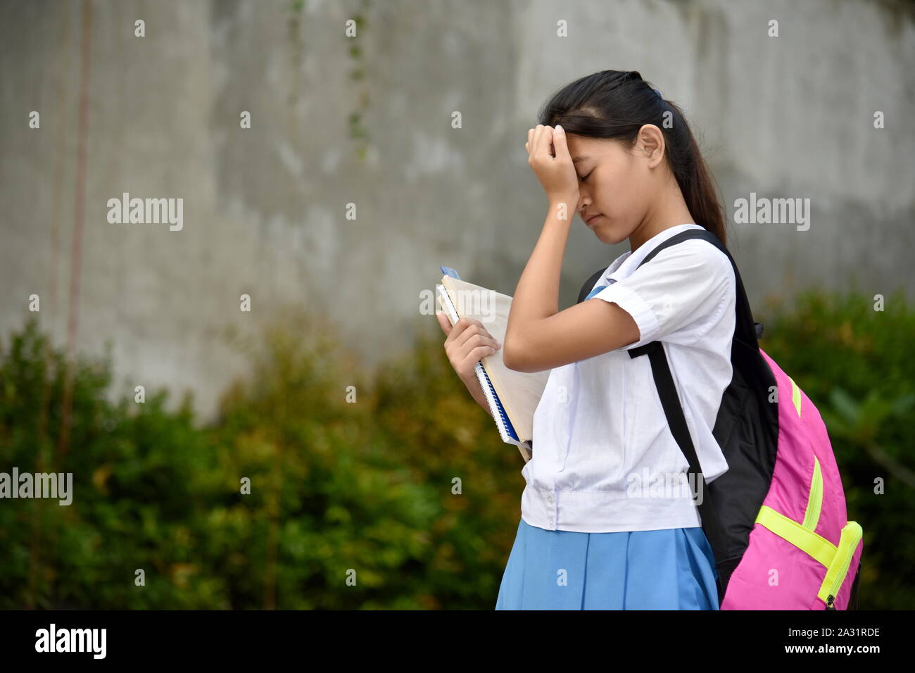 Young Asian Female Student And Sadness Stock Photo - Alamy