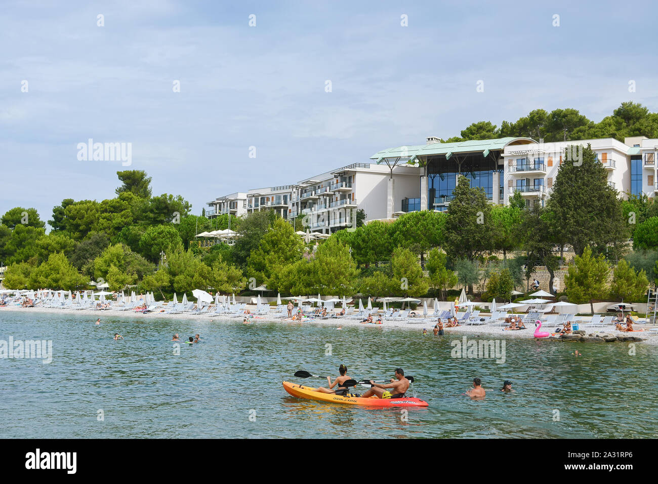 Rovinj, Croatia, August 22: Citizens and tourists sunbathe on Mulini ...