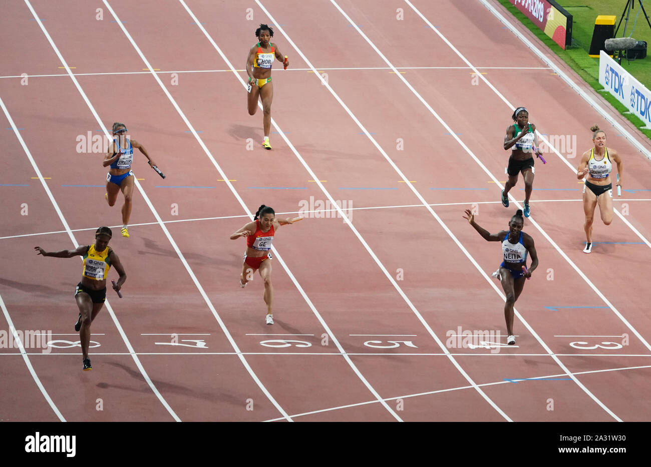 Doha, Qatar. 4th Oct, 2019. Ge Manqi (C, Front) of China competes ...