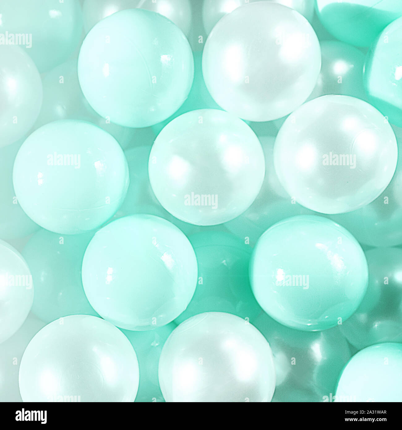 Party background made of mint green pastel color balls bubbles. Top ...