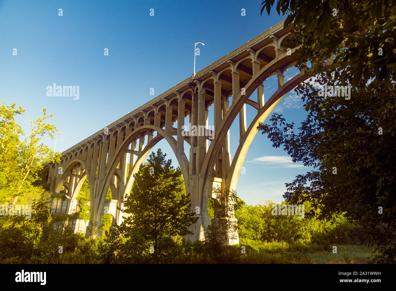 Arch bridge spanning a river in Cuyahoga Valley National Park Stock ...