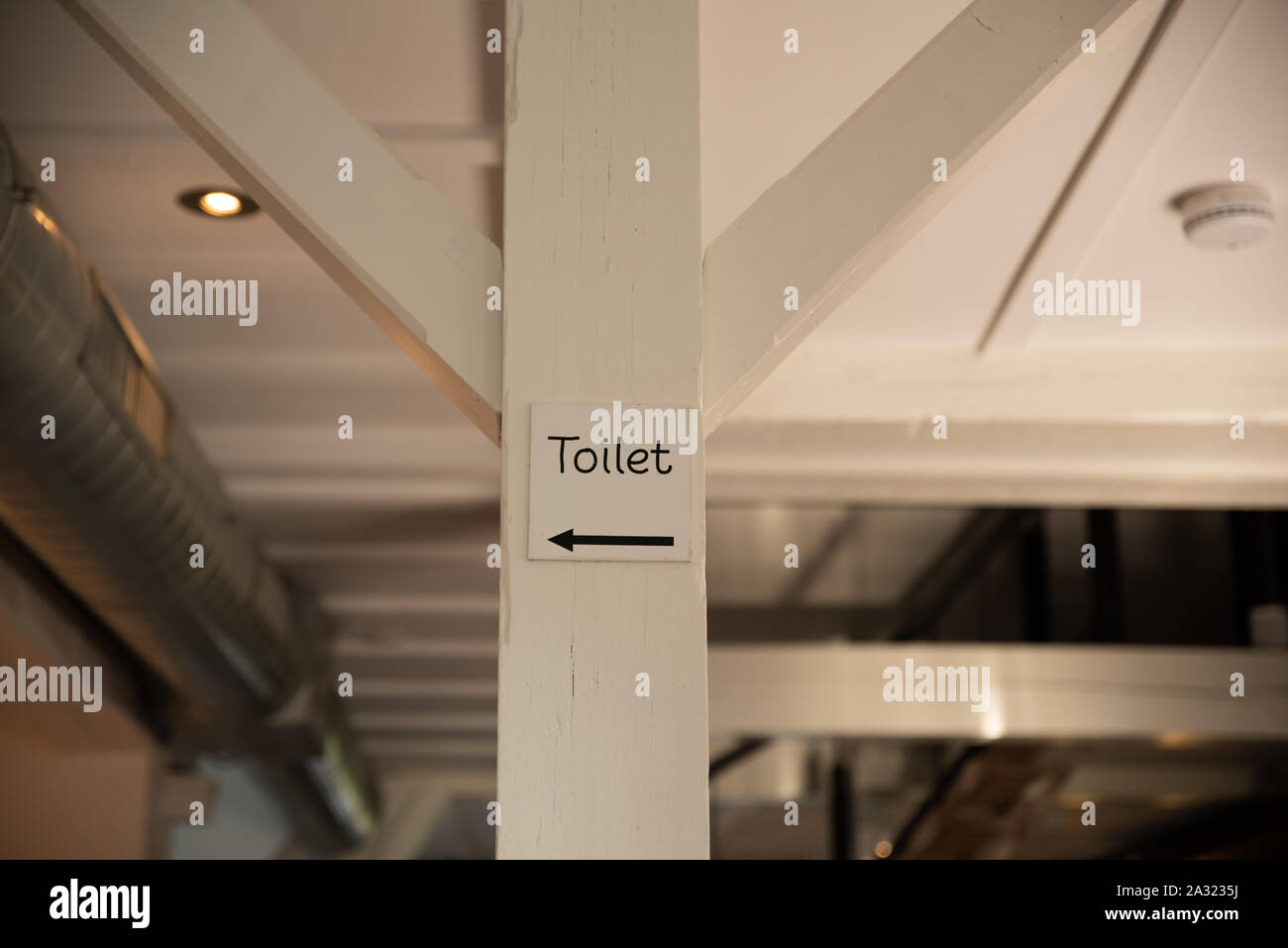 Hanging toilet sign hi-res stock photography and images - Alamy