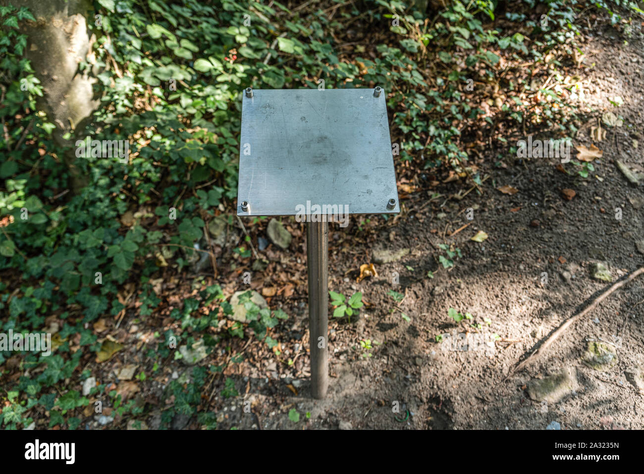 Hanging sign metal pole hi-res stock photography and images - Alamy