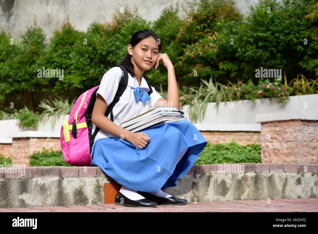 A Youthful Diverse School Girl Thinking Stock Photo - Alamy