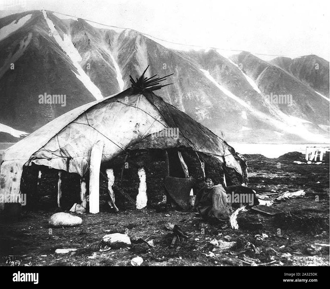Eskimo igloo, Plover Bay, ‘built of sod and whale bone and roofed with ...