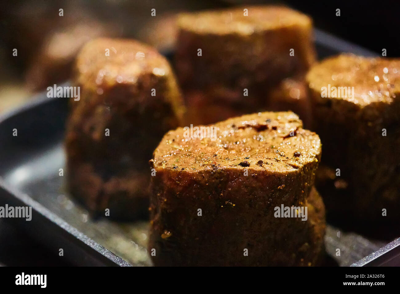 The beef steak in a frying pan. Shallow dof Stock Photo - Alamy