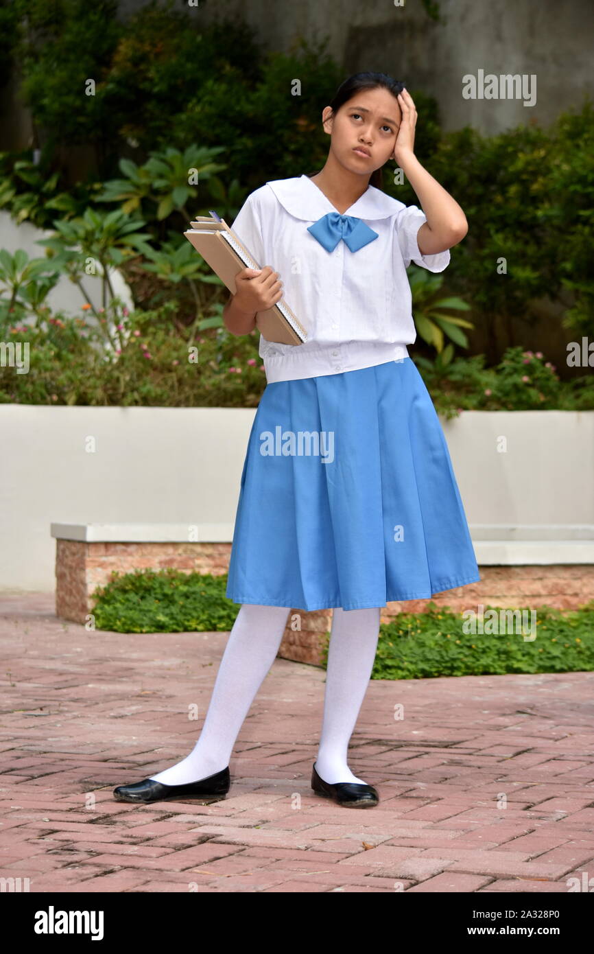 Young Asian Student Teenager School Girl And Memory Loss With School ...