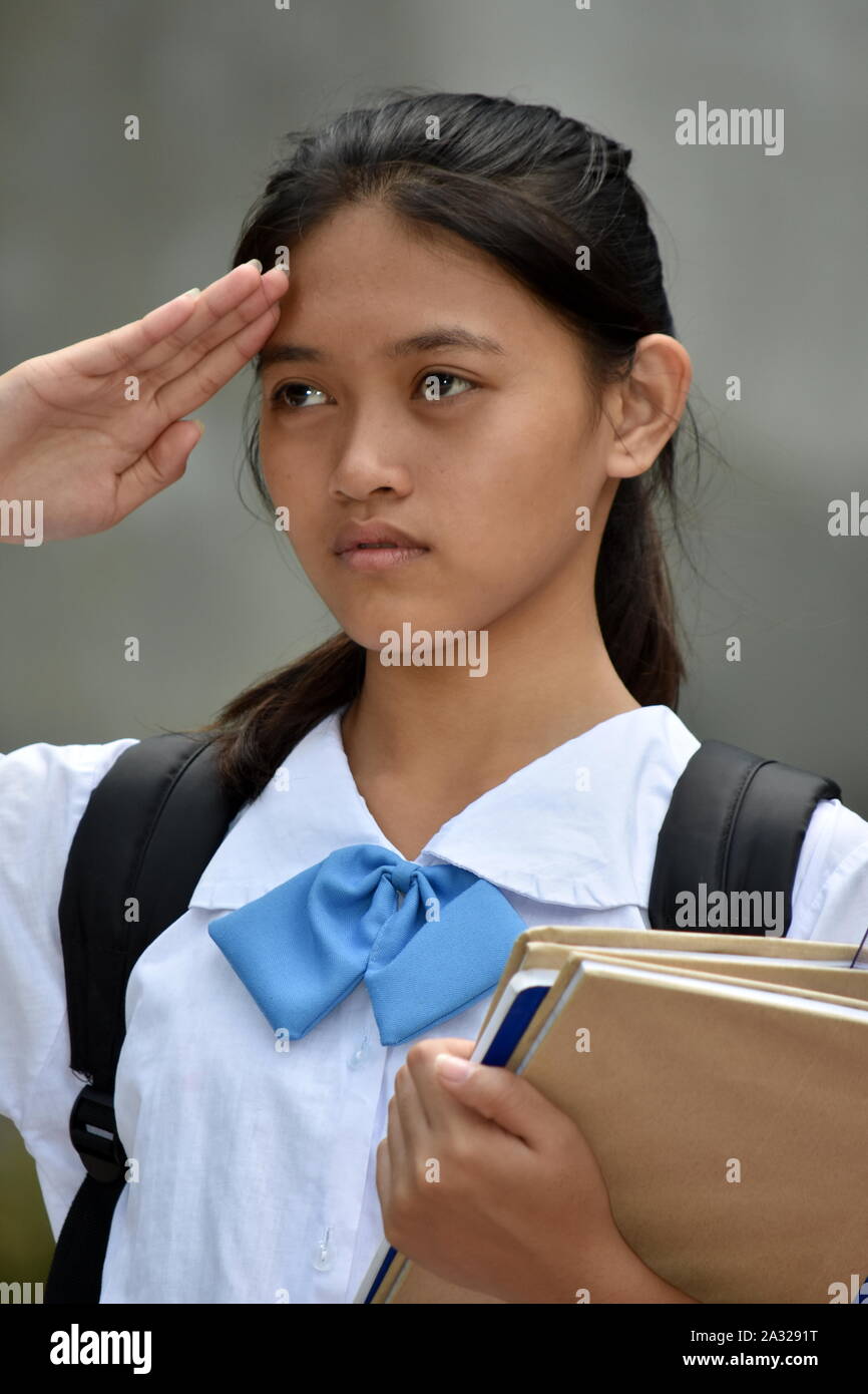 A Saluting Youthful Asian Female Student Stock Photo - Alamy