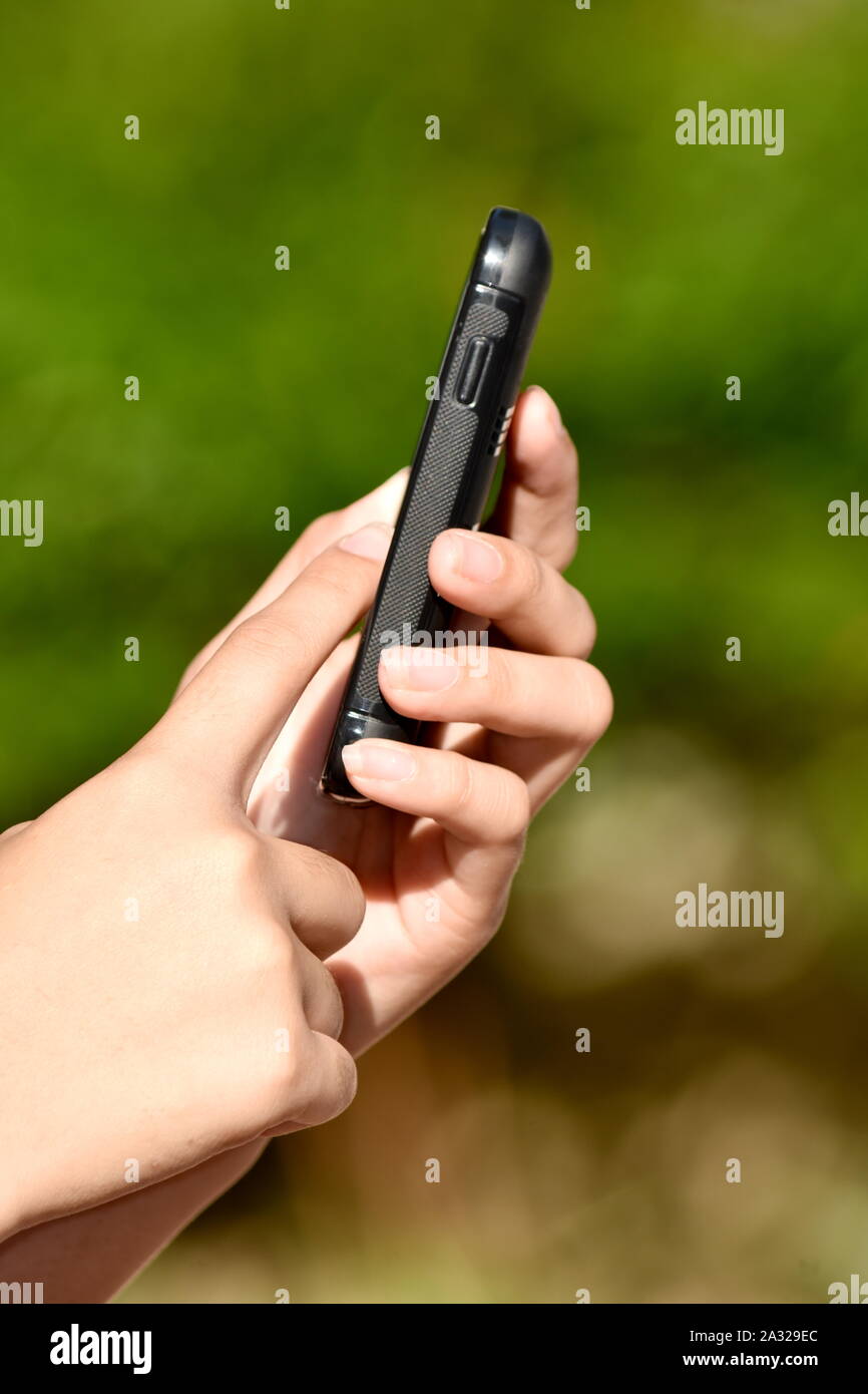 A Hand Holding Mobile Phone Stock Photo - Alamy