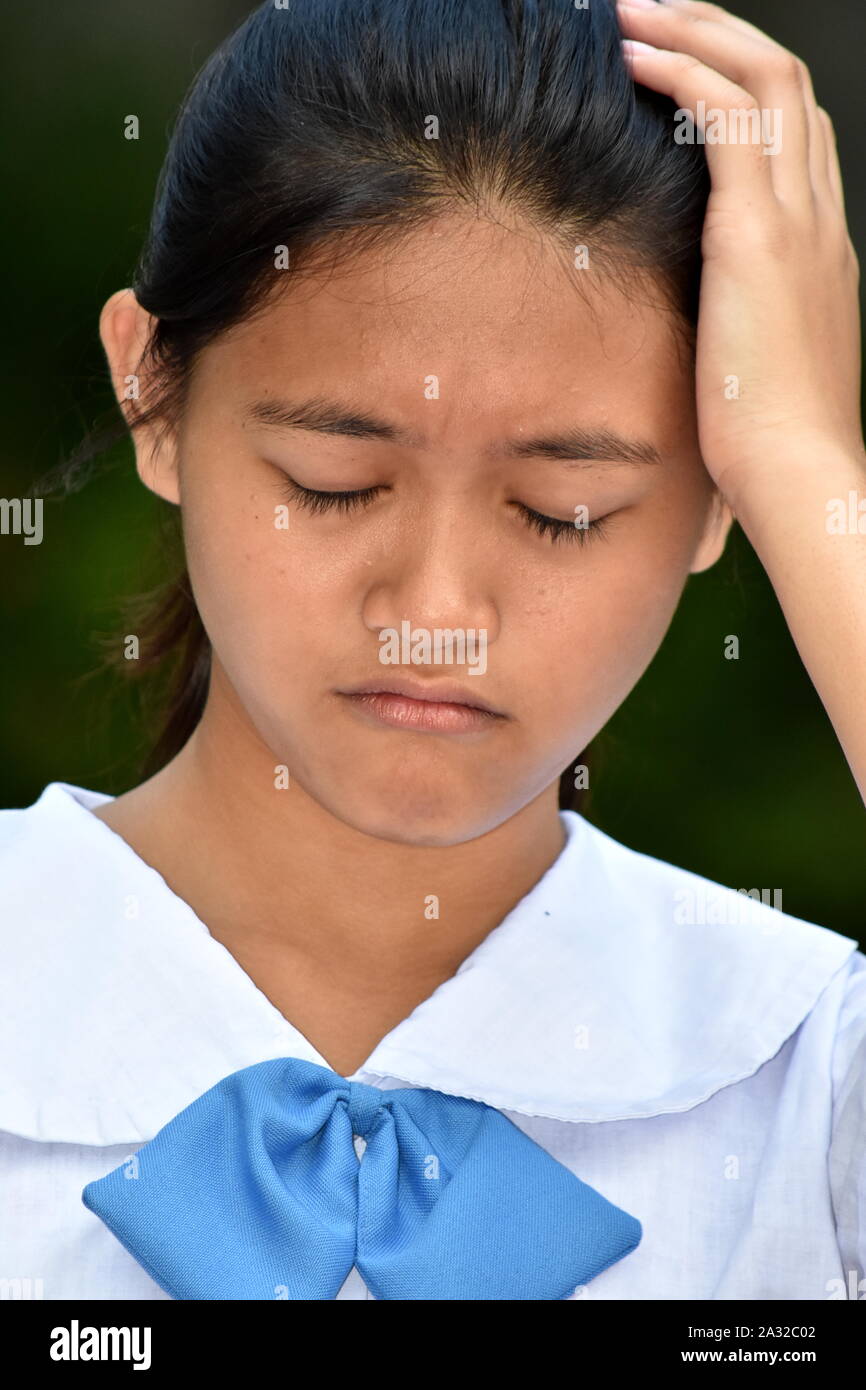 A Sad Beautiful Filipina Person Stock Photo - Alamy