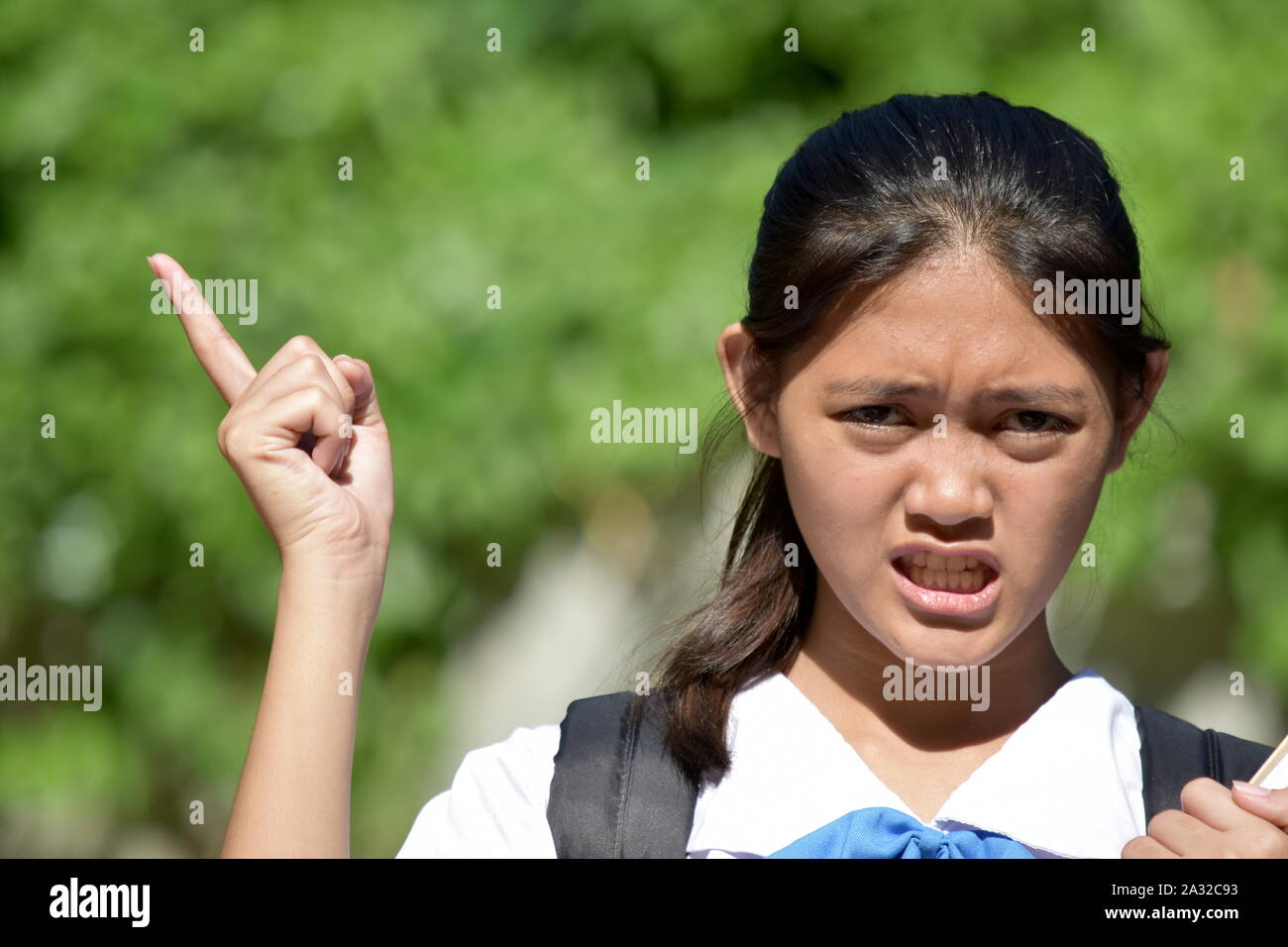 An An Asian Female Student Pointing Stock Photo - Alamy