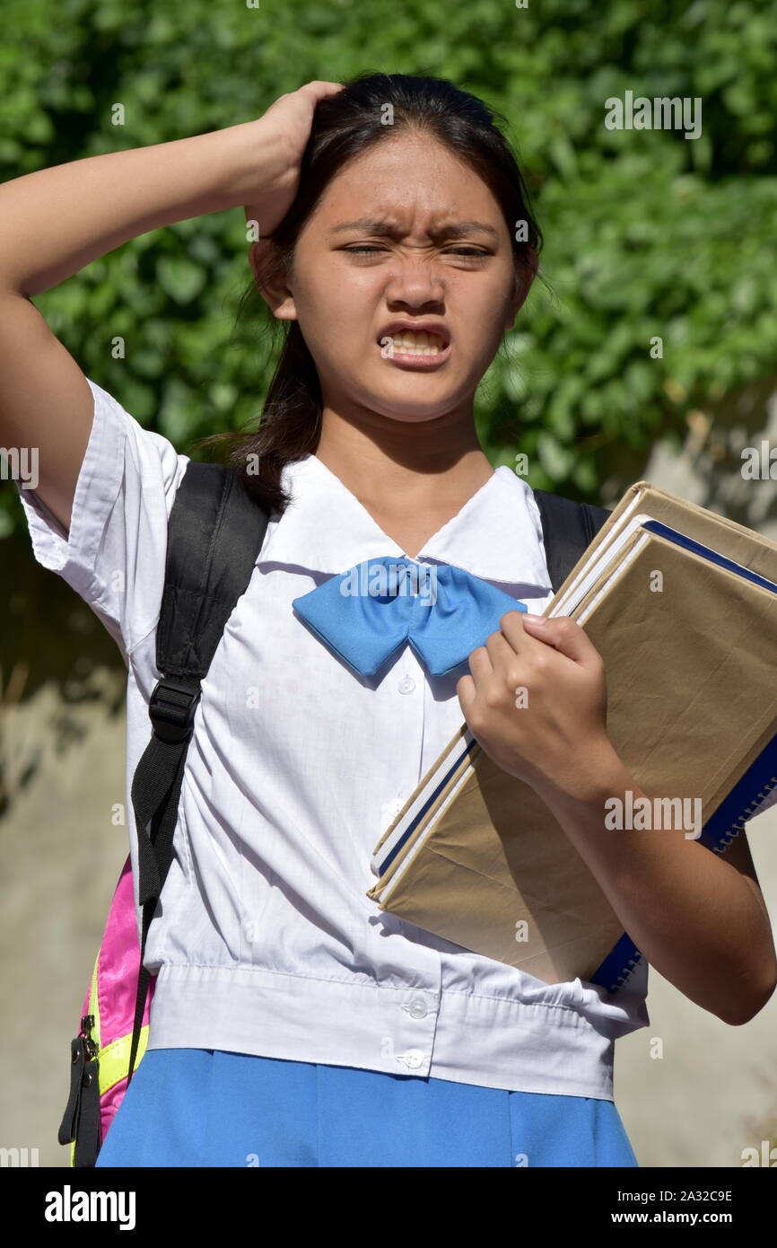 Young Asian Female Student And Confusion Stock Photo - Alamy