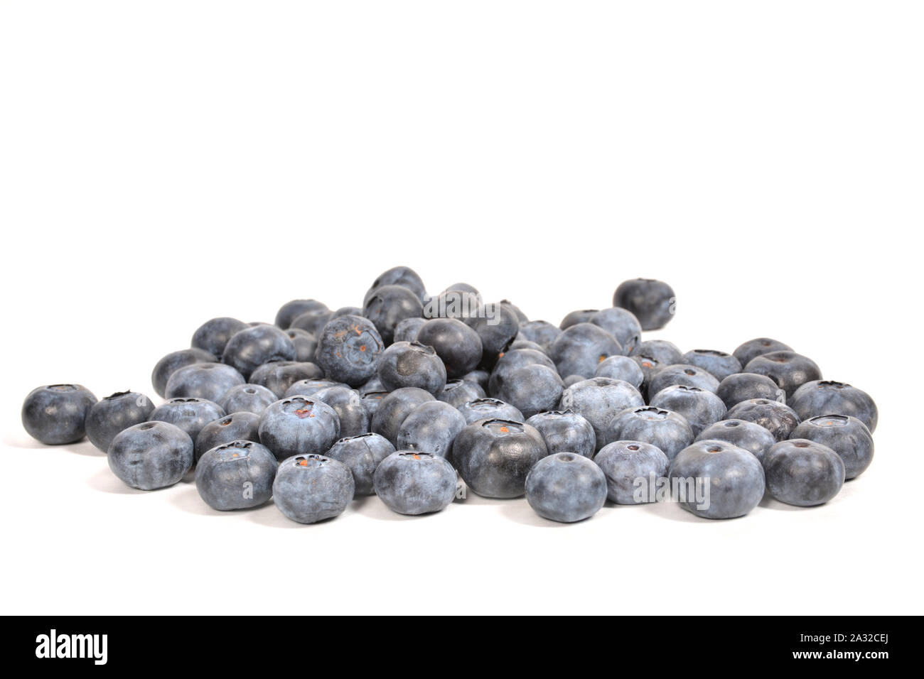 Blueberry pile isolated on white, blue berry pile with copy space Stock ...