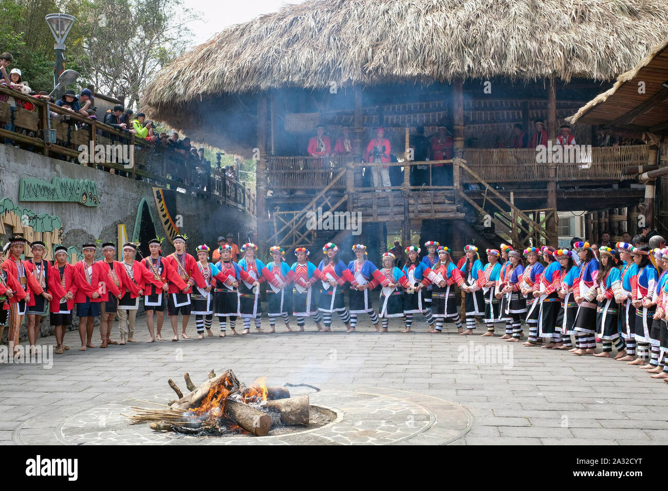 Song and dance celebration of the red and blue-robed Tsou tribe at the ...